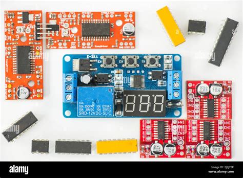 A Top View Of Microprocessor And Microchips On White Background With