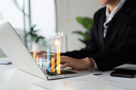 Business Woman Analyzes Profit Ability Of Working With Digital Graph Positive Indicators In