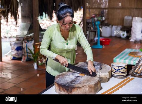 A Worker Prepares Traditional Packs Of Coconut Candy At A Local Coconut Candy Factory Quoi Son