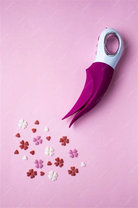 Premium Photo Pink Vibrator With A White Handle Toy For Adults Lies