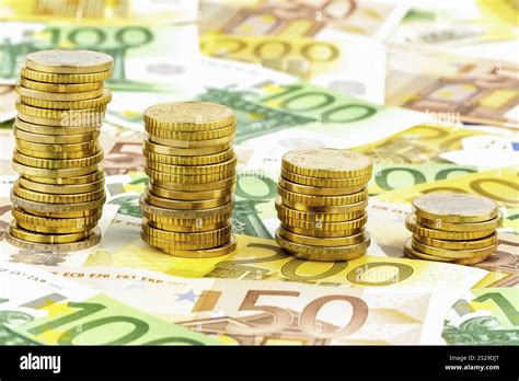 Stack Of Coins Falling Curve Symbolic Photo For Falling Interest