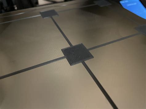 how can i fix those little blobs on top of the center square my
