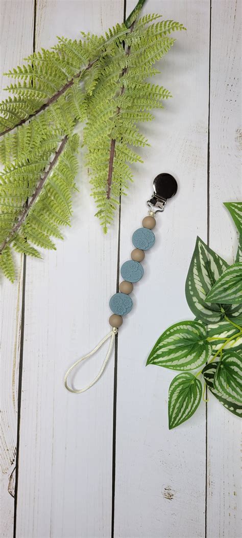 Dusty Blue Floral Embossed Pacifier Clip Silicone Sassy Silicone