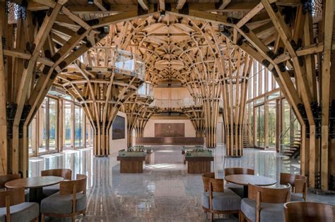 Glass Building In China Is Filled With Timber Pillars In The Shape Of Trees