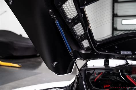 C8 Corvette Carbon Fiber Hood Struts Blue Paragon Performance