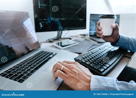 Programmer Working On Computer In It Office Typing Data Coding In Software And Checking Code On