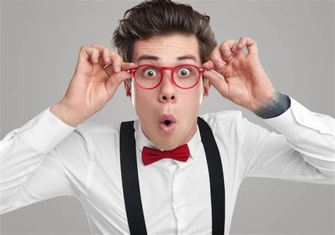 Premium Photo Funny Geek In Glasses Looking At Camera