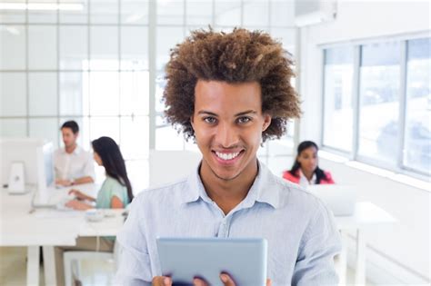 premium photo casual worker using tablet pc