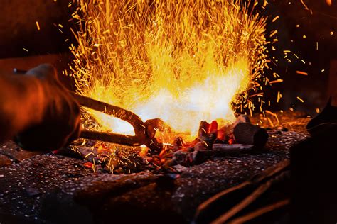 Forging A Metal Heart With Traditional Techniques Blacksmith At Work