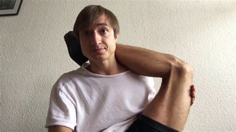 Flexible Man With Lleft Leg Behind Head