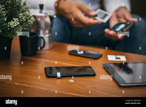 SIM Card For Smart Phone The Man Changing The SIM Card Stock Photo Alamy