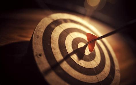 Premium Ai Image Precision Striking Bullseye An Arrow Hitting Its Target With Accuracy