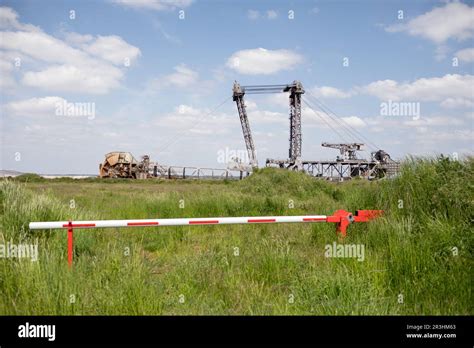 Landscape At Open Pit Hambach Lignite Mine In A Summer Landscape Showing Massive Rwe Machinery