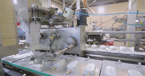Apparatus For Sorting Ice Cream Slow Motion Ice Cream Dosing Machine On A Conveyor Line Slow