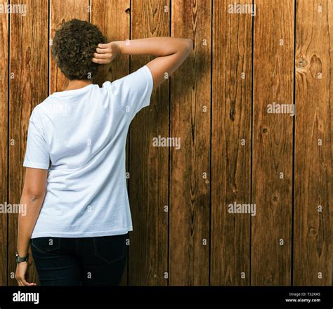 Beautiful Young African American Woman Wearing Glasses Over Isolated Background Backwards