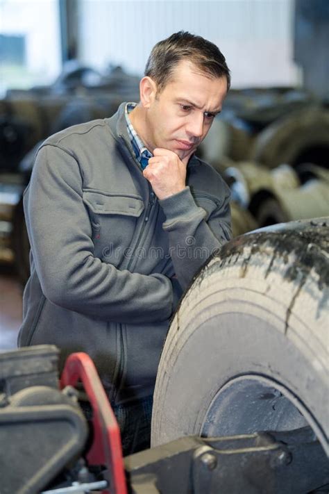 Portrait Construction Worker Checking Digger Tyre Stock Image Image Of Gorgeous Happy 261155825