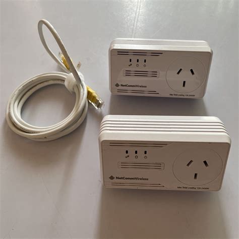 2x Netcomm Wireless Np505f Powerline Adapter With Ac Pass Through