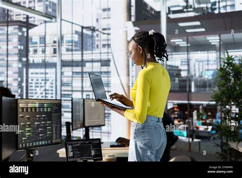 Machine Learning Infrastructure Technician Using Laptop To Develop