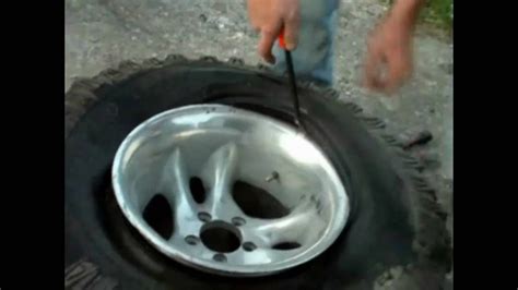 How to change a tire from a rim without a machine - YouTube