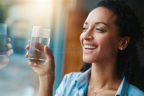 Theres Nothing More Refreshing A Woman Drinking A Glass Of Water At Home Stock Image Image