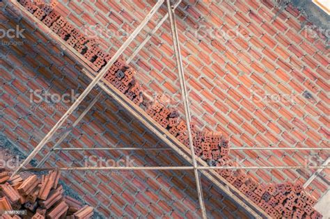 New Interior Red Brick Wall With Scaffolding Under Construction Texture