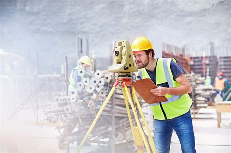 Engineer Using Theodolite Stock Image F0154566 Science Photo Library