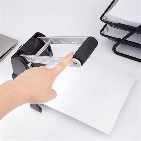 เครื่องเจาะรูกระดาษ 2 รู แบบคันโยก รุ่นประหยัดแรง Deli No 0130 [เจาะได้สูงสุด 100 แผ่น] Shopee