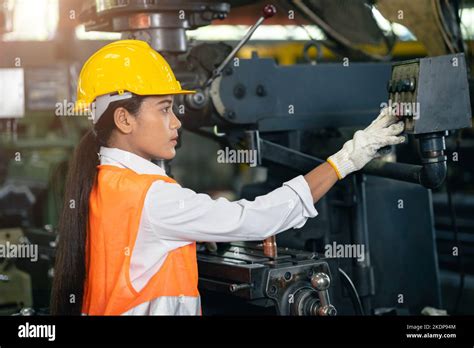 Teen Girl Working With Lathe Metal Work Shop Steel Factory Industry