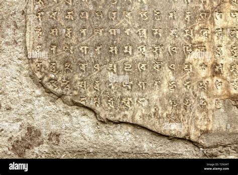 Ancient Japanese Language Engraving In Stone Monument At Famous Senso