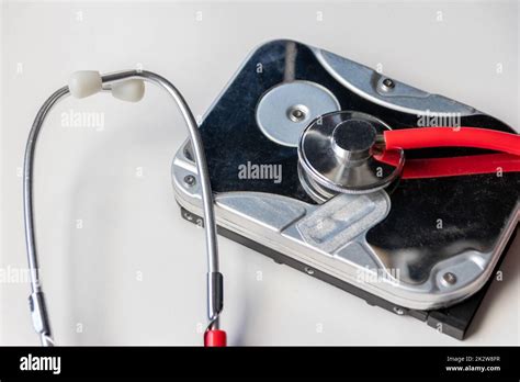 Red Stethoscope With Internal Hard Disk Drive Hdd Contains Health Record And Sensitive Patient