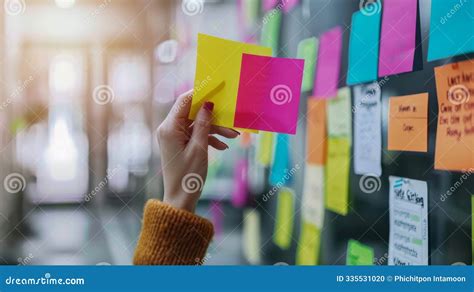 Woman Holding A Yellow Sticky Note Scrum Methodology Boards Agile Software Development Concept