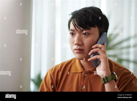 Worried Developer Calling Coworker Calling System Administrator Stock