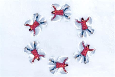 Premium Photo The Girl On A Snow Angel Shows Pattern
