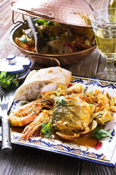 Traditional Portuguese Seafood Cataplana With King Prawns Mussels And