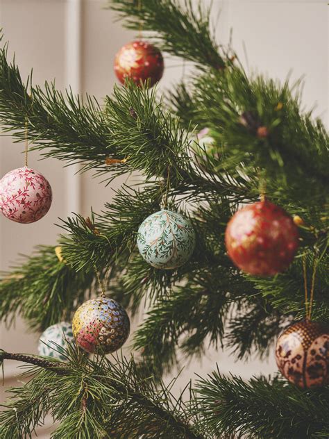 la technique du x pour un sapin de noël parfaitement décoré