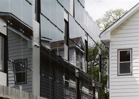 548 Stradbrook Is Covered In Reflective Shingle Like Glazing
