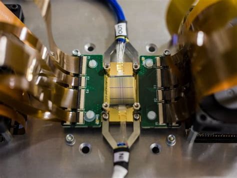 M For Qubit Photonic Quantum Computer