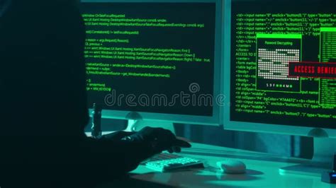 Hacker Is Typing On A Computer Keyboard And Cracking A Password A Man In A Black Hoodie And
