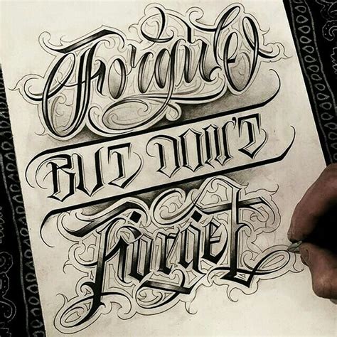 Chicano Lettering Tattoo