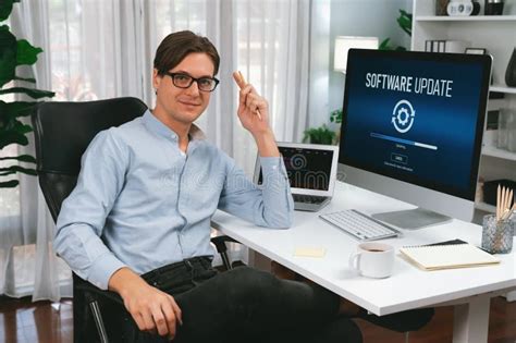 Smiling It Looking Camera With Software Update Loading On Pc Pecuniary Stock Image Image Of