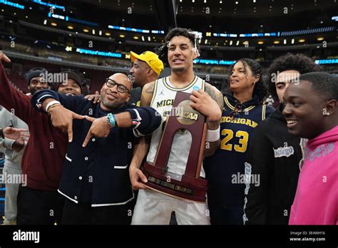 Michigans Yaxel Lendeborg Holds The Trophy After Defeating Tennessee