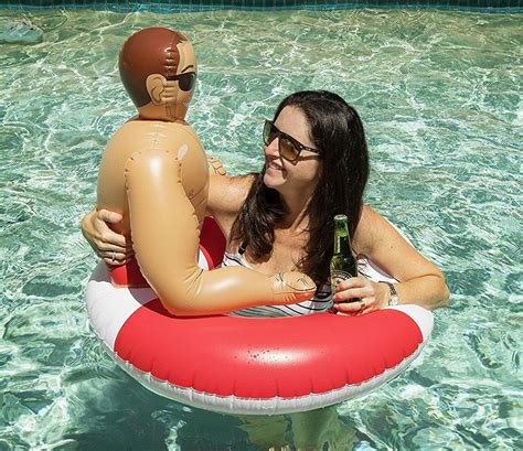The Inflatable Hunk Pool Float Is Here To Heat Up Your Summer And He Ll Even Hold Your Beer