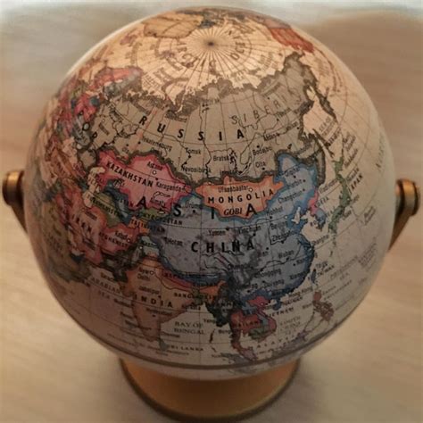 Premium Photo High Angle View Of Globe On Table