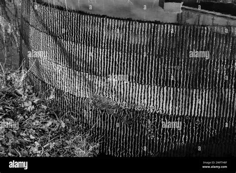 Abstract Reflection Image Of Slatted Cladding On A Modern