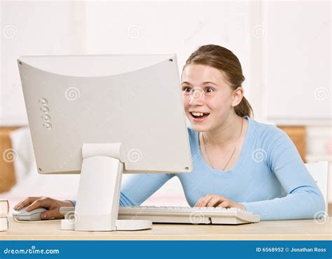 Teenage Girl Looking At Computer Monitor Stock Photography Image 6568952