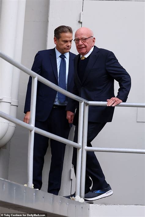 Media Mogul Rupert Murdoch Is All Smiles As He Enters Court With His