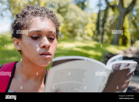 Close Up Portrait Of Concentrated Young Latin Argentinian Brunette