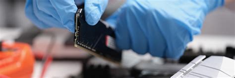 Premium Photo Technician Connects Cpu Microprocessor To Motherboard