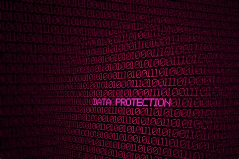 Glowing Red Binary Code On Screen With Words Data Protection Background