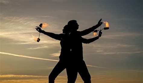 Premium Photo Ignite Your Dancing Flame Dancing Couple Spin Burning